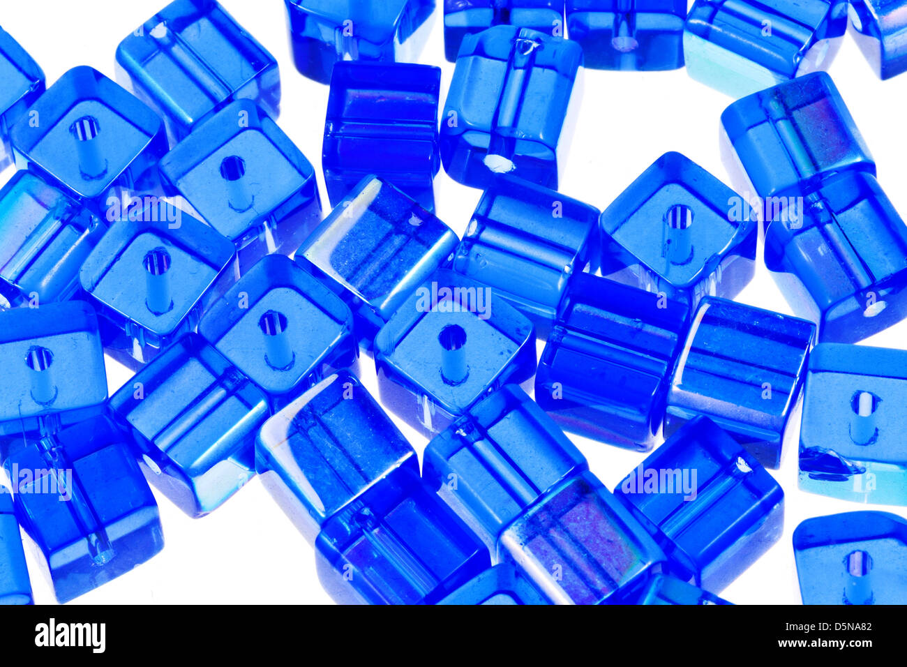 blue glass cubic bugles close up isolated on white background Stock ...