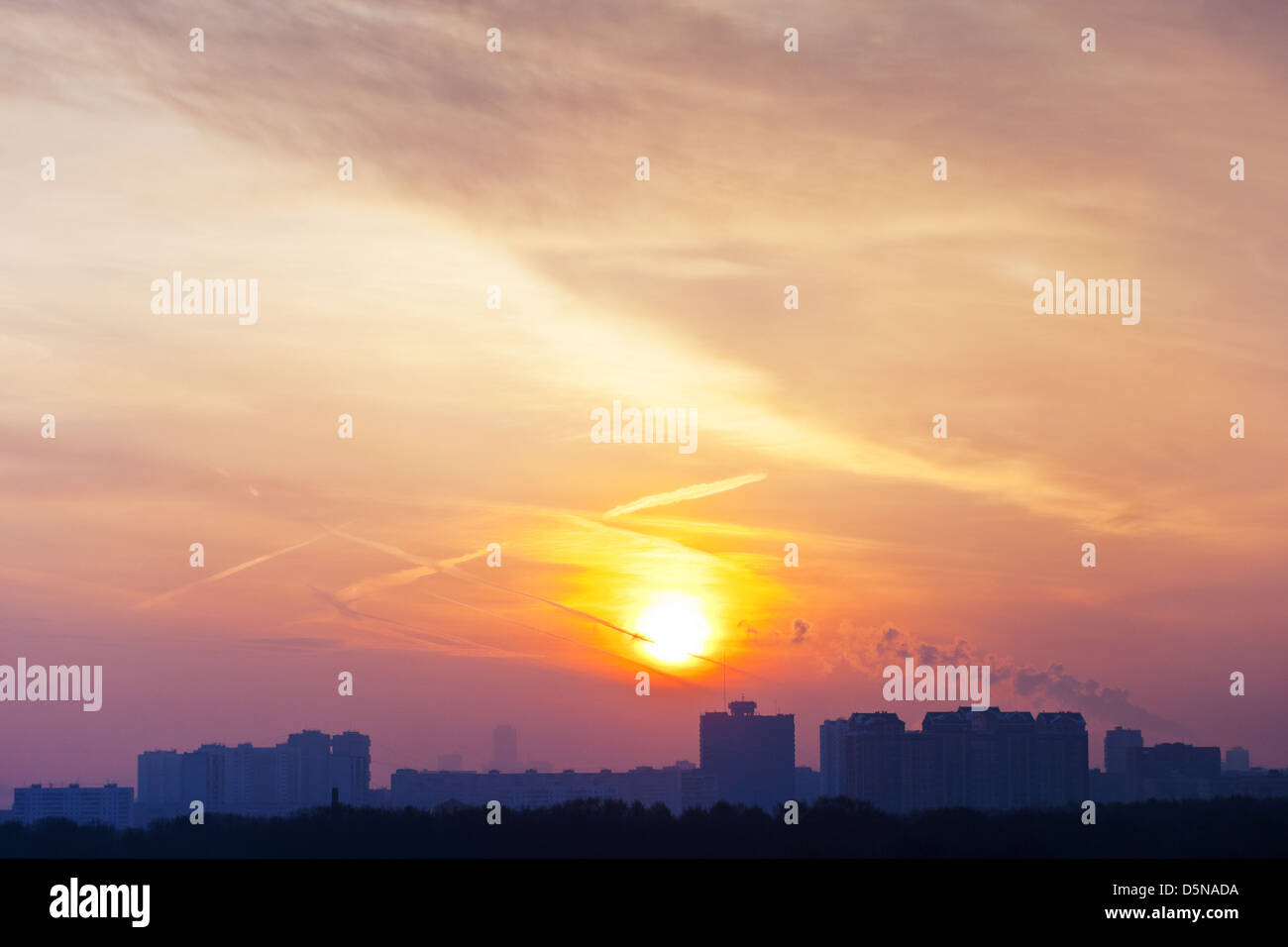 orange early rising sun under city Stock Photo - Alamy