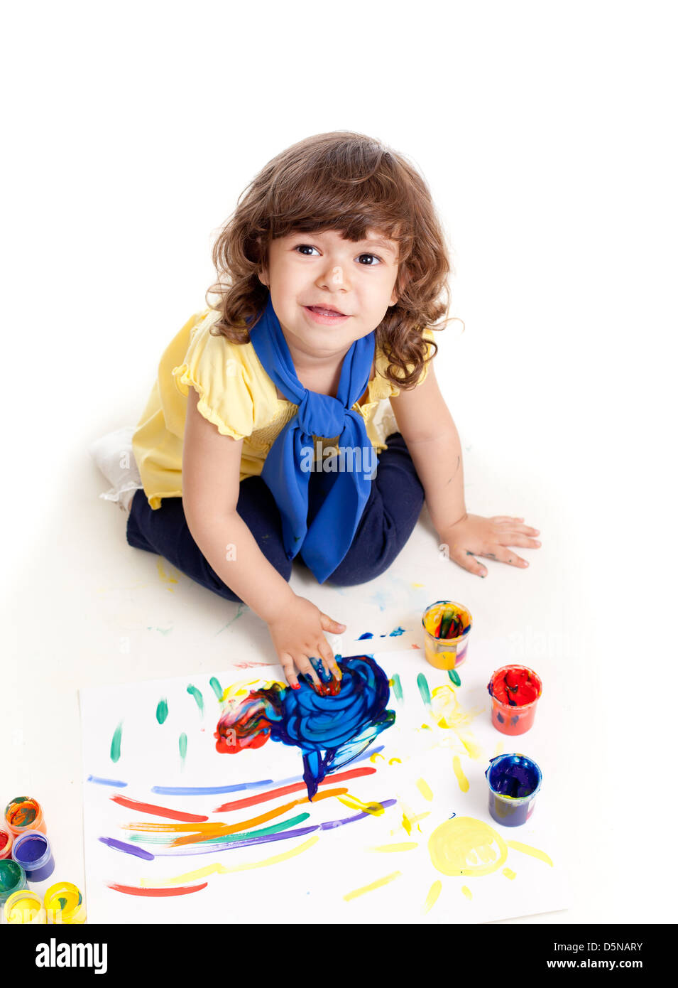 Cute artist kid drawing and painting. Top view of girl Stock Photo - Alamy
