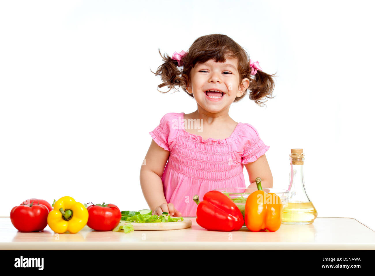 smiling child with fresh vegetables Stock Photo - Alamy