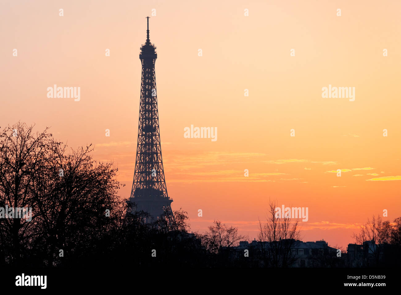 eiffel tower in Paris on red - yellow sunset Stock Photo - Alamy
