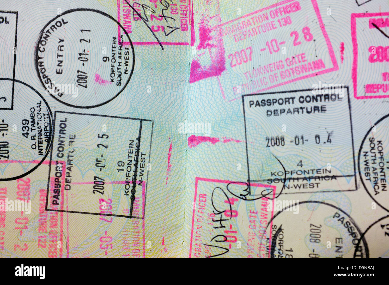 A Visa page in a passport covered in Visa stamps from past trips Stock ...