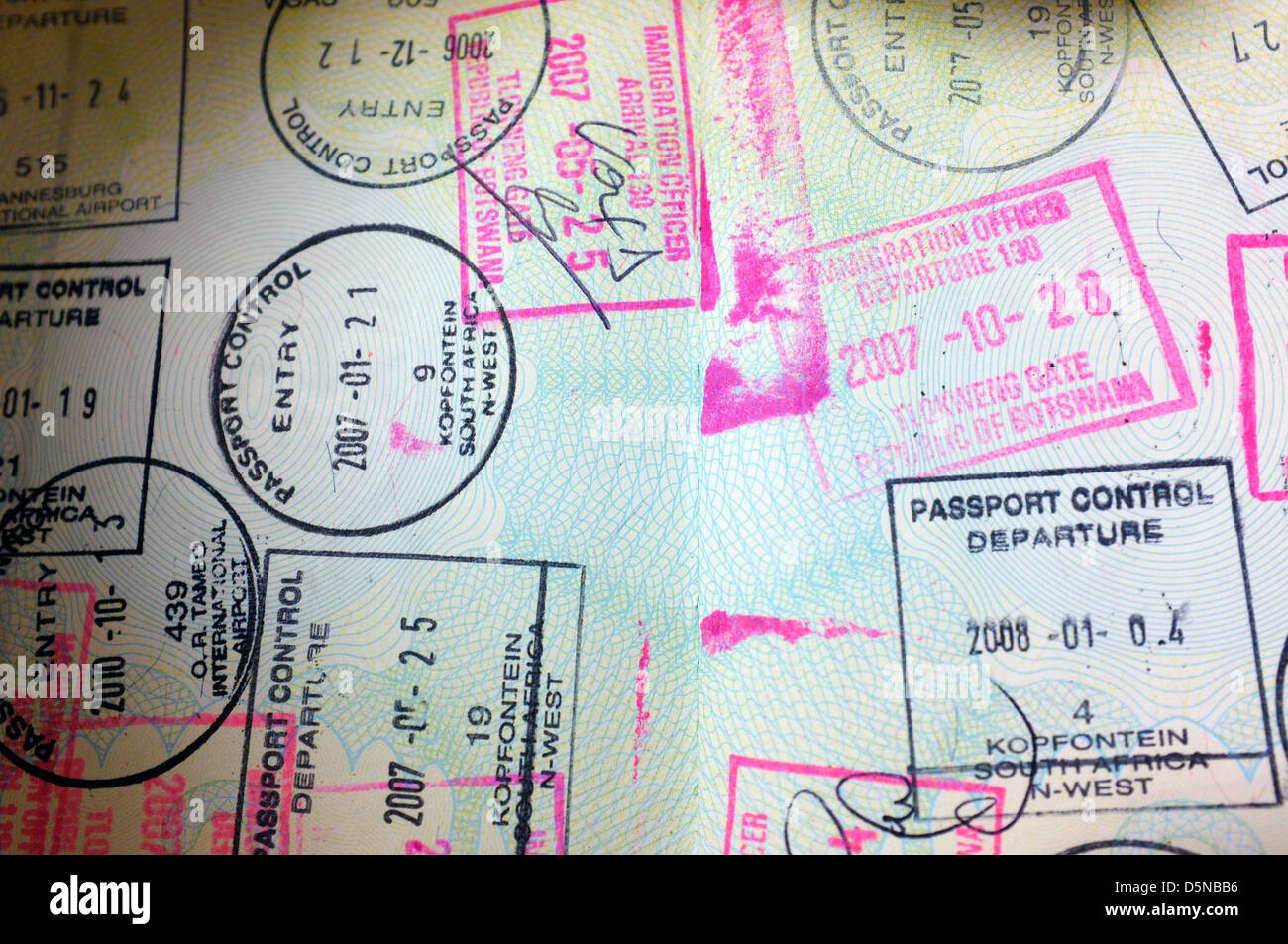 A Visa page in a passport covered in Visa stamps from past trips Stock ...