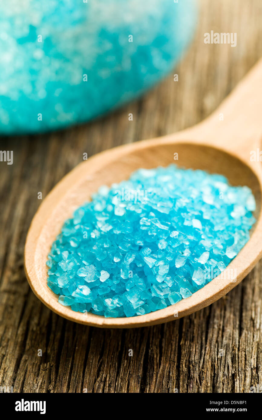 the blue bath salt in wooden spoon Stock Photo - Alamy