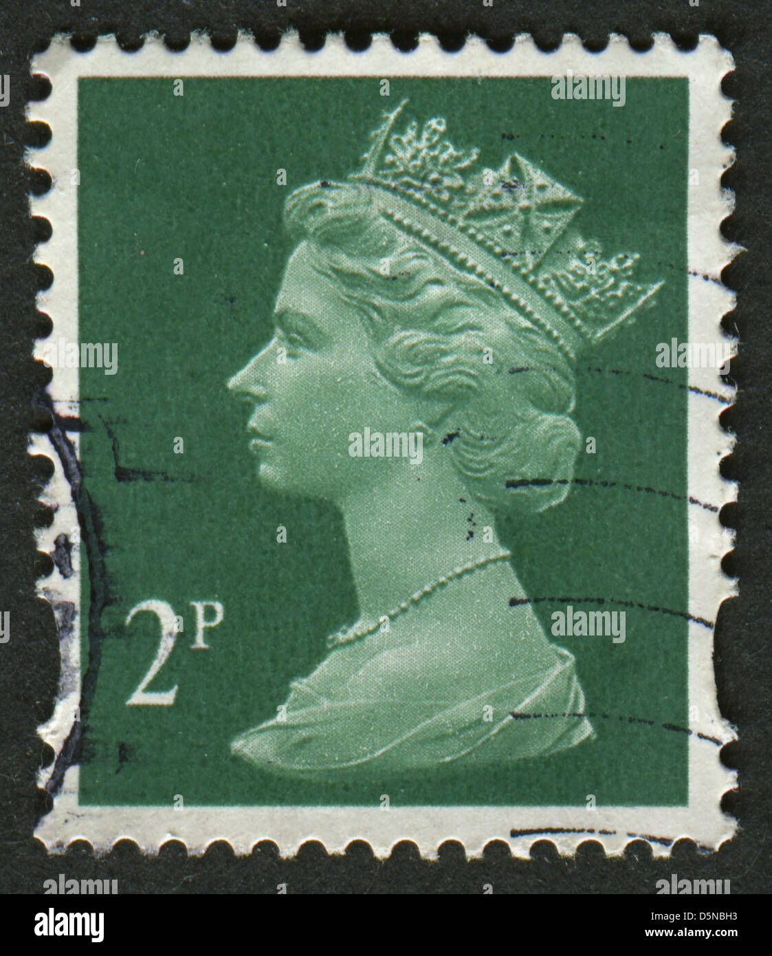 A stamp printed in UK shows image of Elizabeth II is the constitutional ...