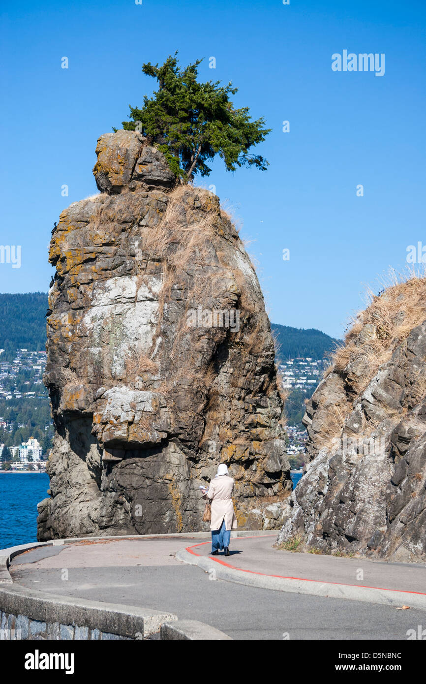 Siwash rock in Stanley Park. Vancouver, British Columbia, Canada Stock ...