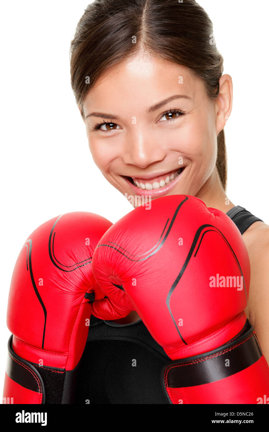 Portrait of sporty fit Asian Caucasian young woman in wearing red ...