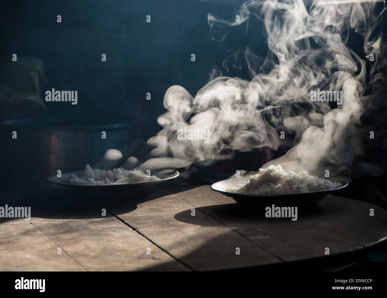 warm plates of rice at a market in Myanmar Stock Photo - Alamy