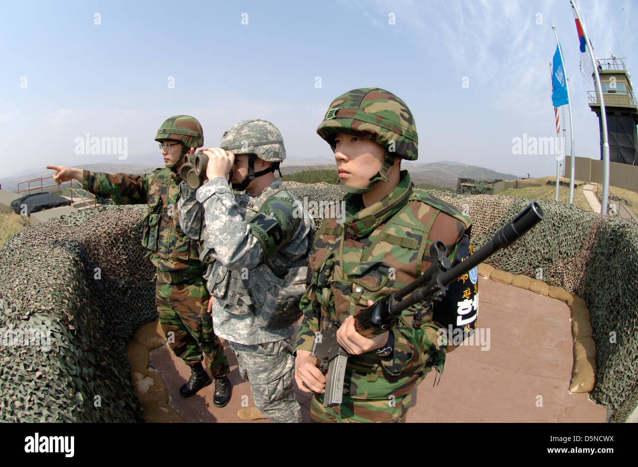 A scene from the Korean Demilitarized Zone (DMZ) depicting various ...