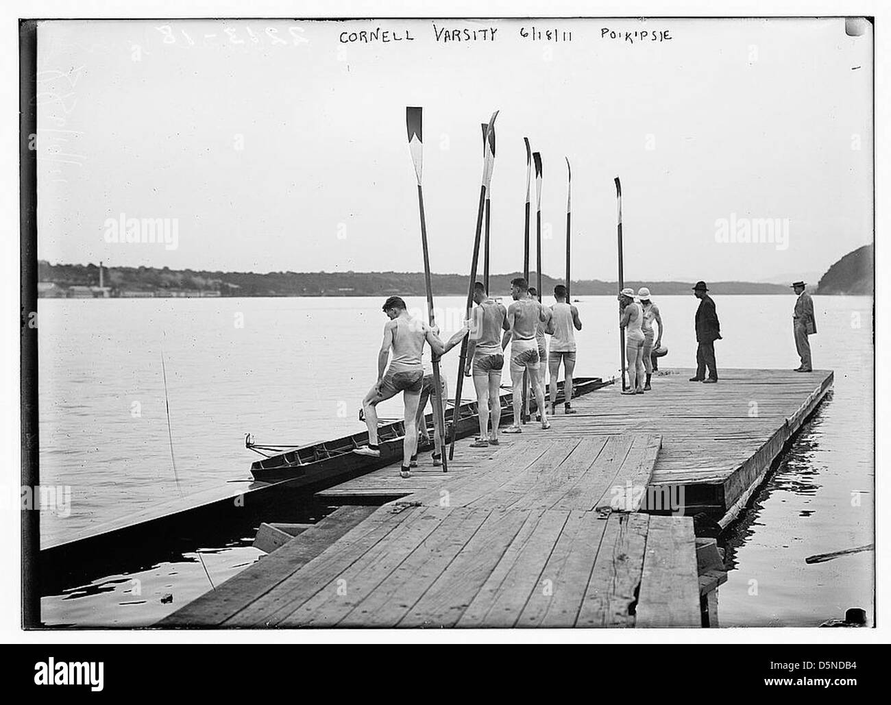 The photograph shows the Cornell University Varsity rowing team in 1911 ...