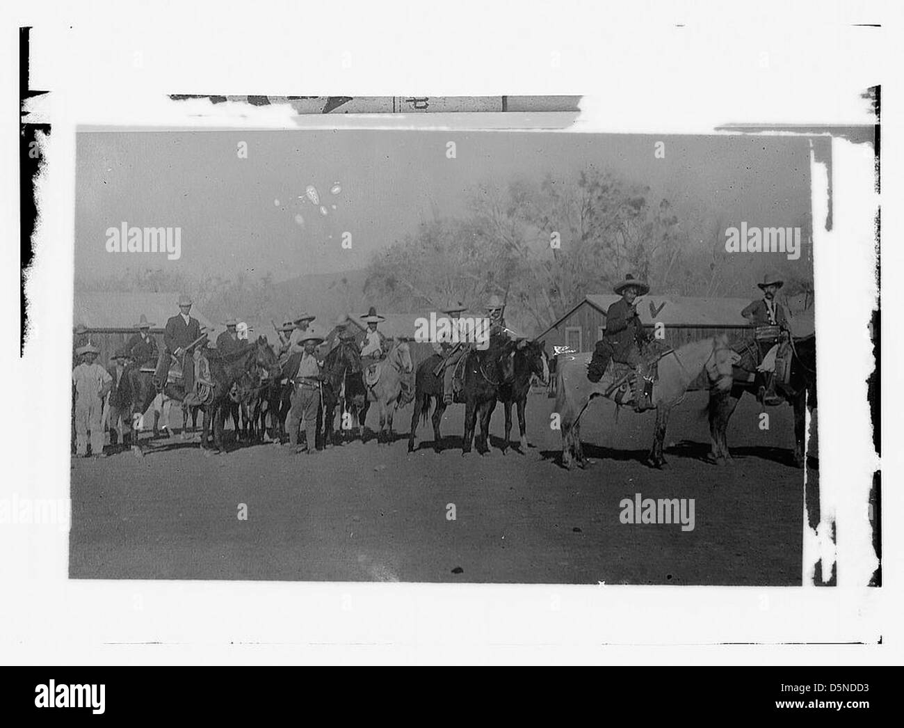 This black-and-white photograph shows Mexican Insurrectos ...