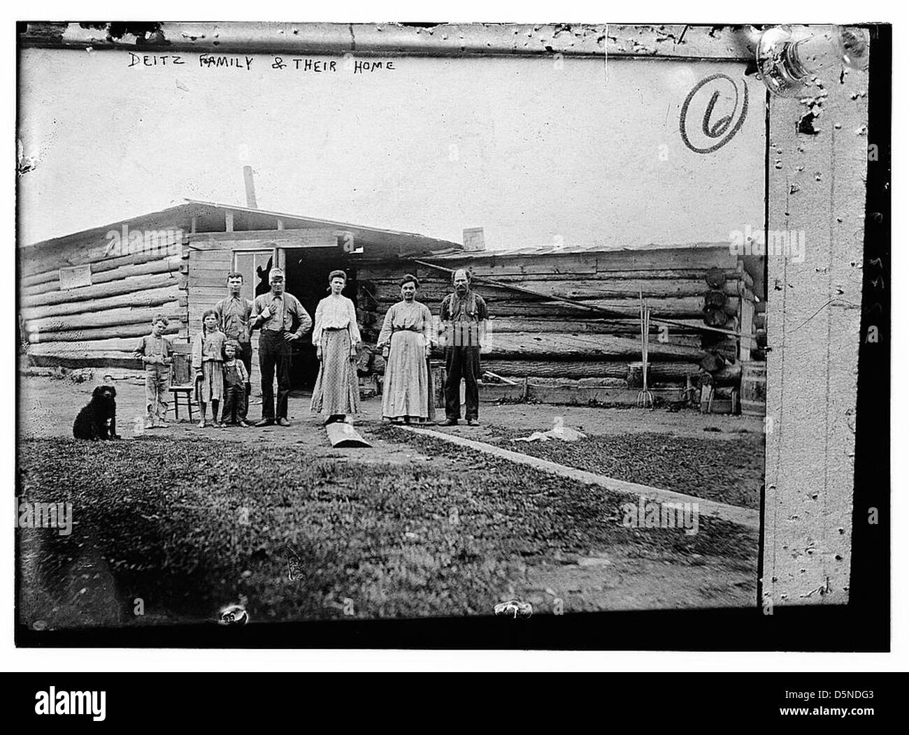 A photograph of the Deitz family at their home taken in the 1910s. This ...