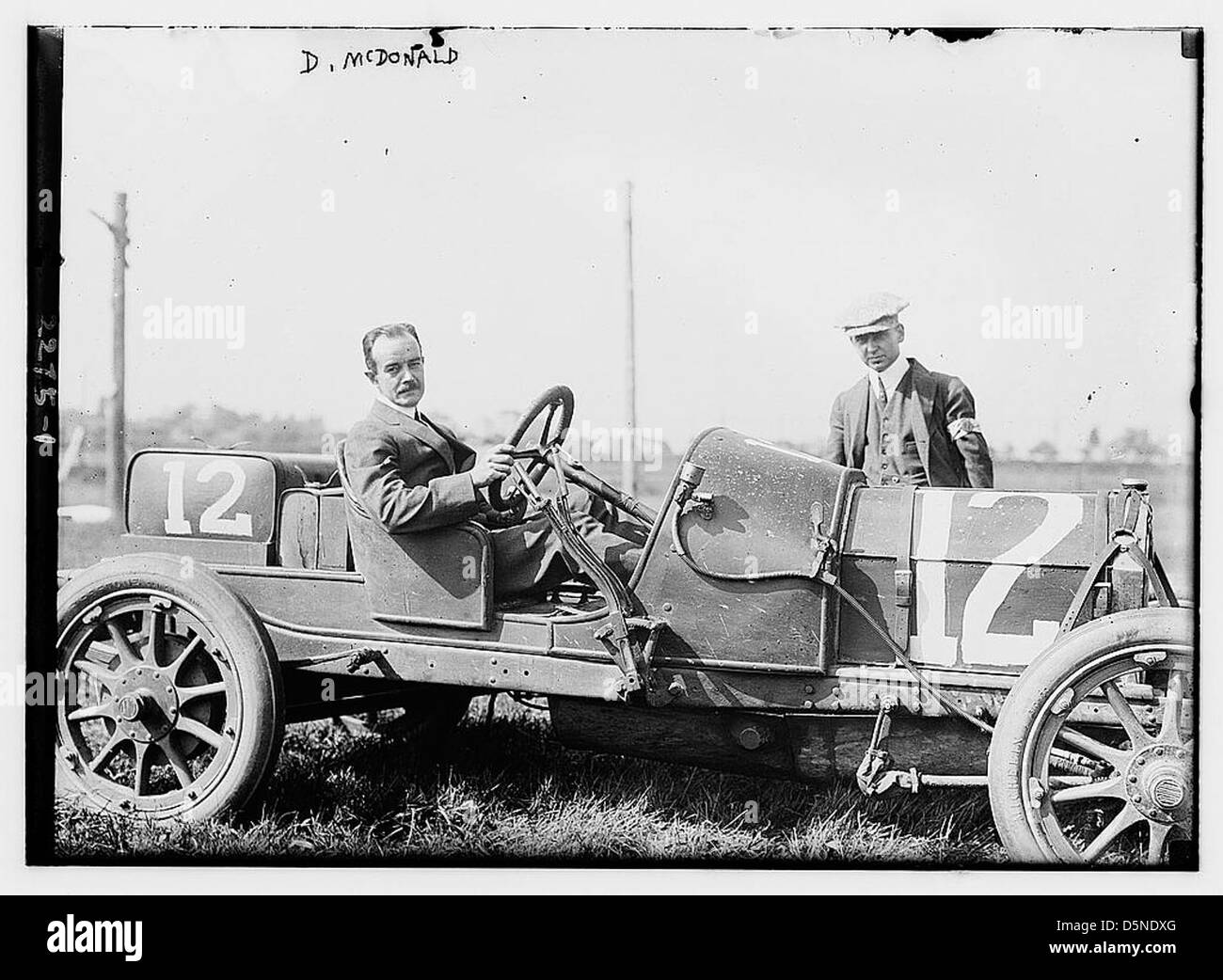 This photo shows D. McDonald, likely a racing enthusiast, in a vintage ...