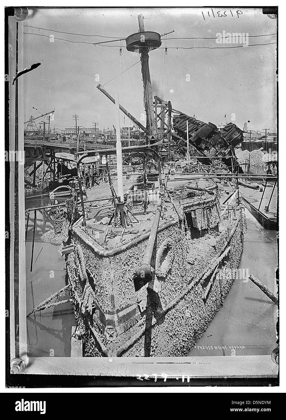 This photograph depicts the USS Maine in Havana harbor, Cuba, during ...