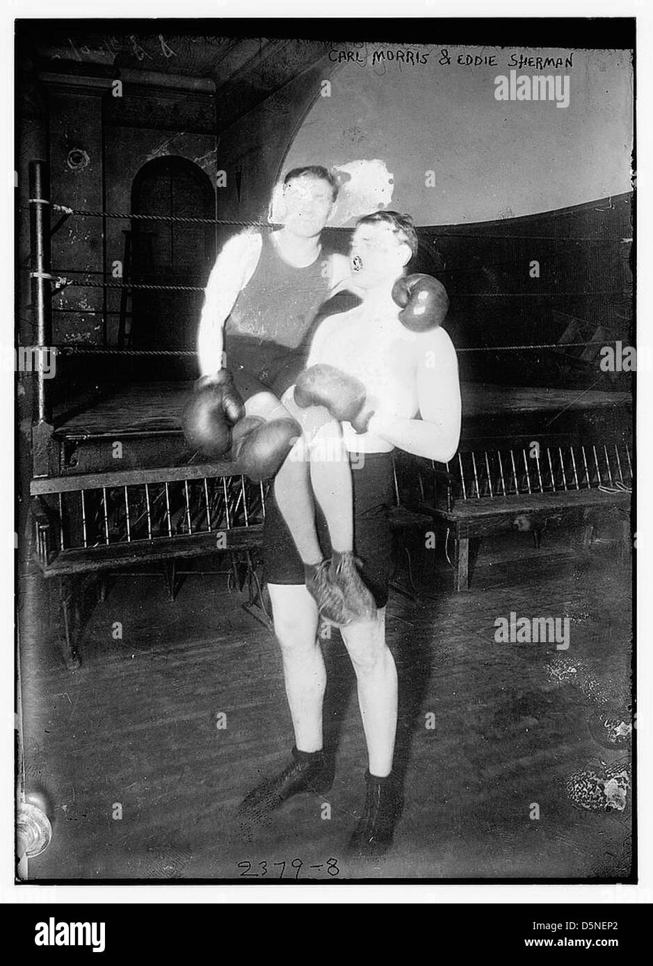 This photograph shows boxers Carl Morris and Eddie Sherman in the ...