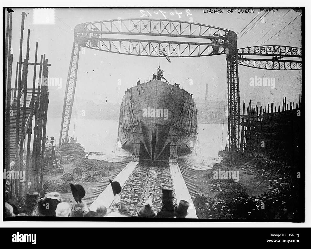 This photograph captures the launching of the HMS Queen Mary in Jarrow ...