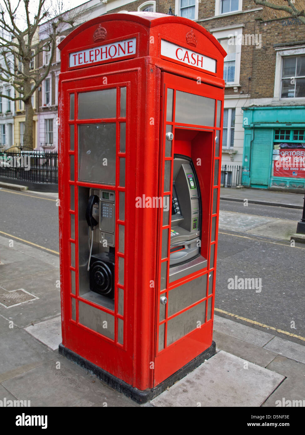 Telephone box and cash machine near Portobello Road, London, England ...