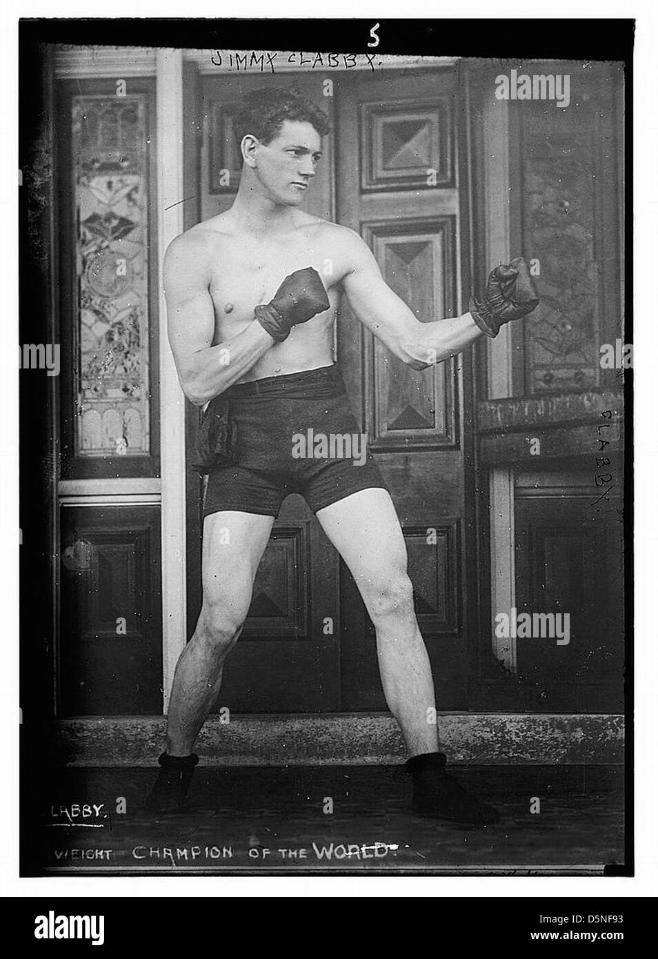 This black-and-white photograph depicts Jimmy Clabby, a professional ...