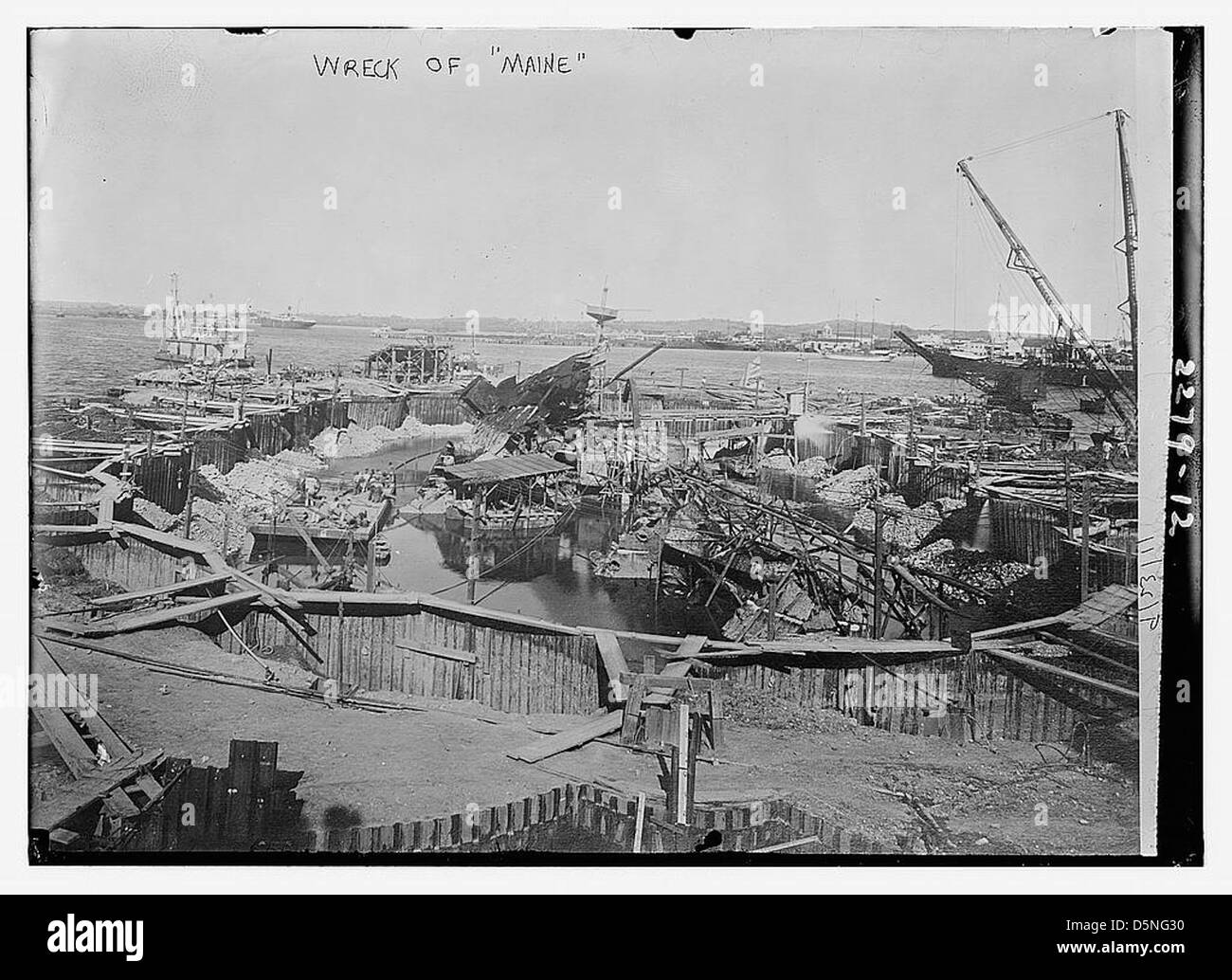 The image captures the wreckage of the USS Maine (ACR-1) in Havana ...