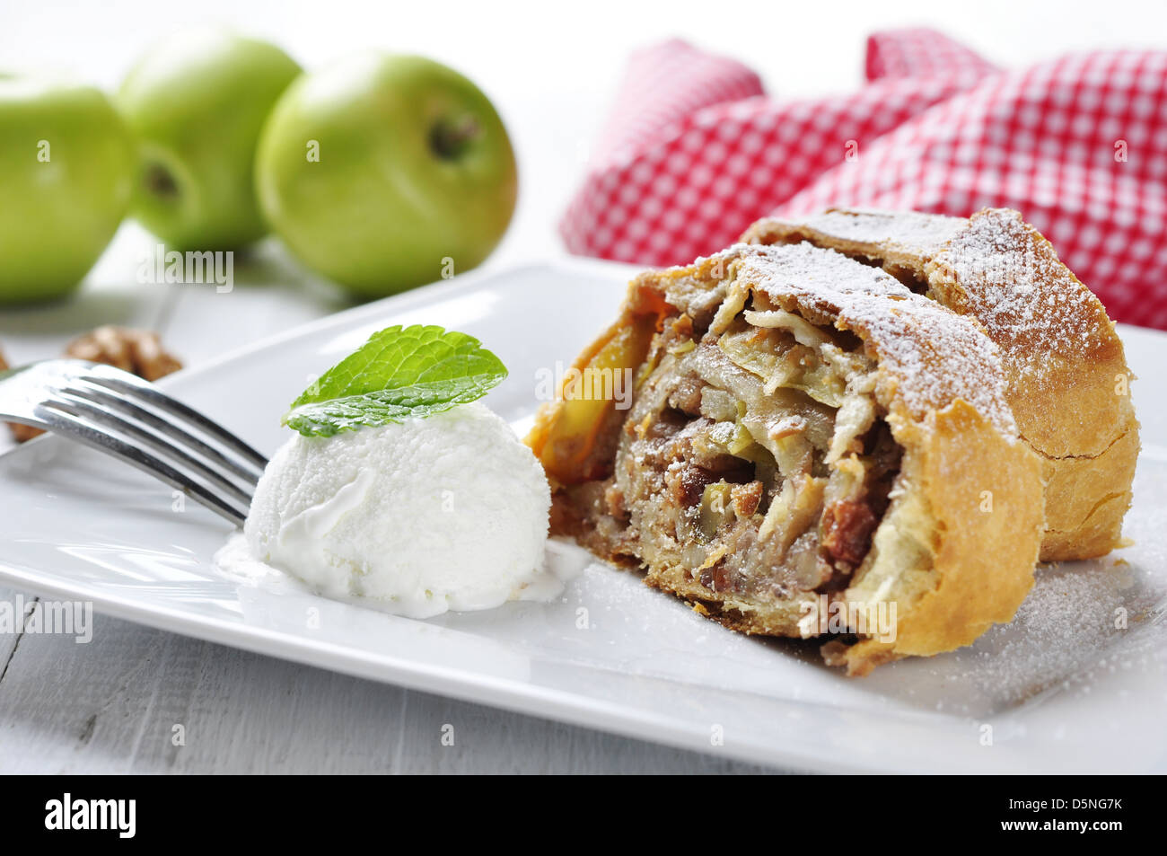 Apple strudel with ice cream and cream hi-res stock photography and ...