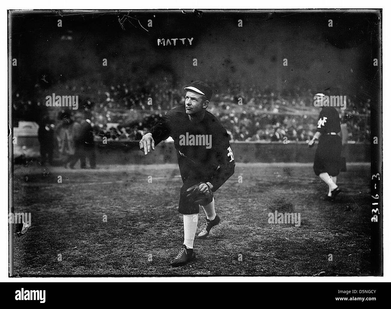 This photograph shows Christy Mathewson warming up before the 1911 ...