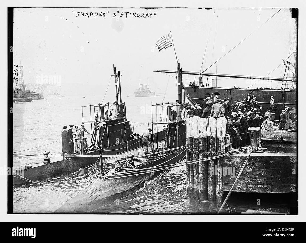 This photograph features the submarines USS Snapper (SS-13) and USS ...