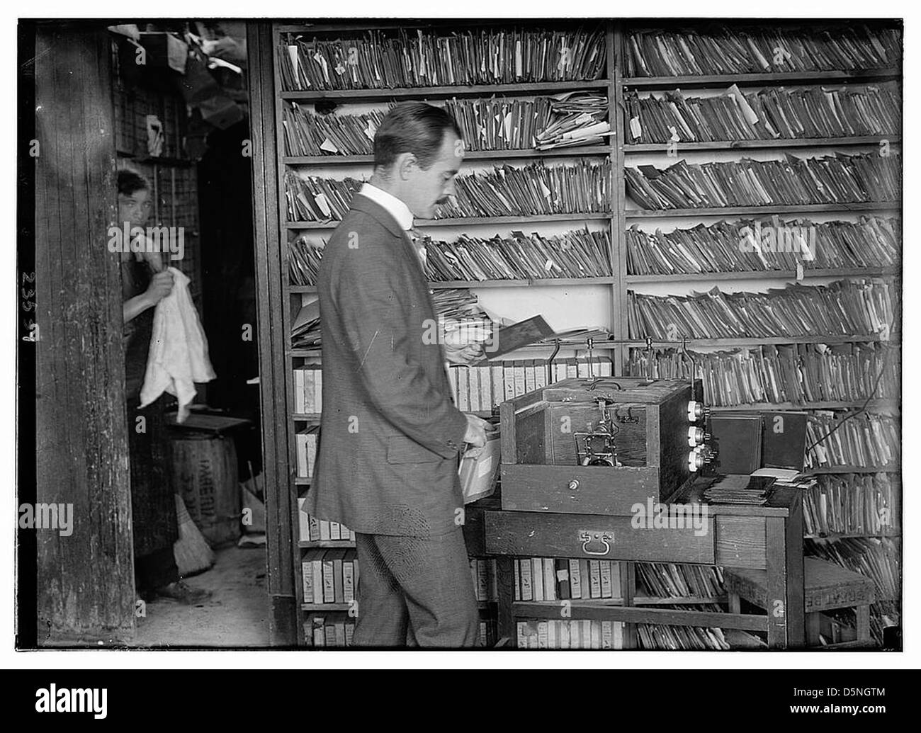 A photograph showing the process of printing photographs by the Bain ...