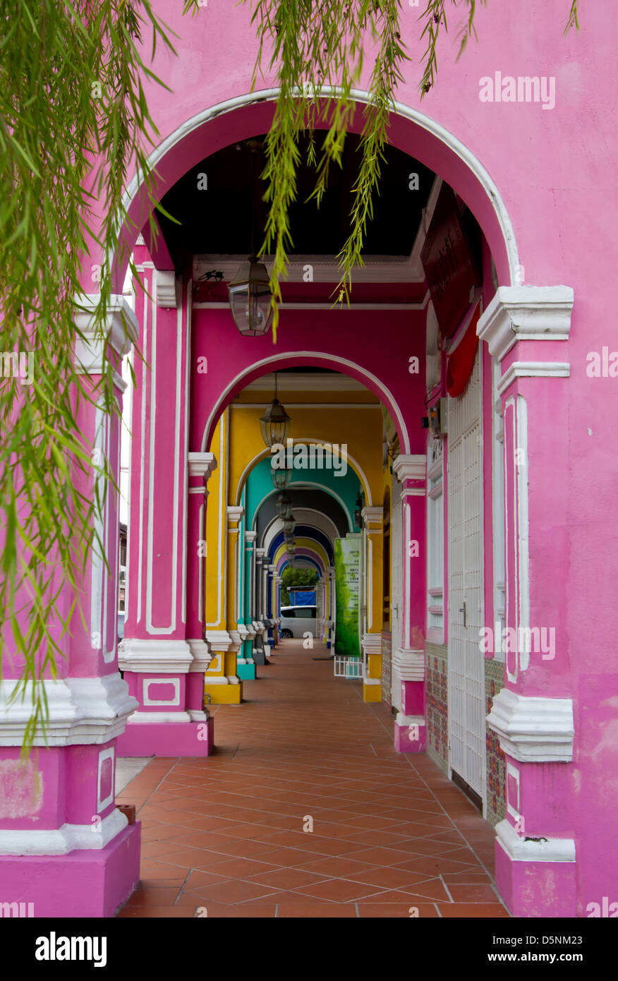 Shops with colorful arches Stock Photo - Alamy