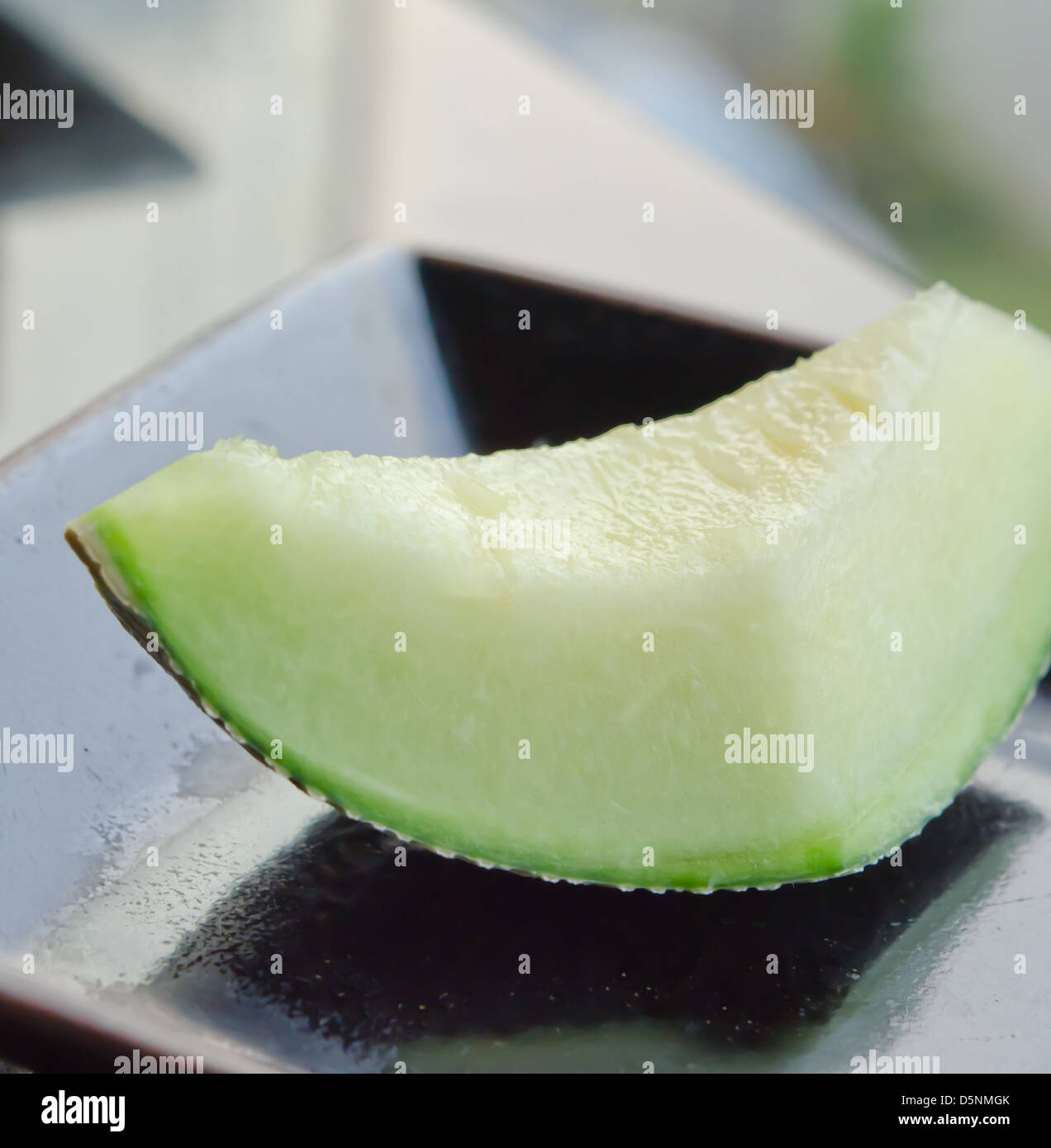 Melon slices hi-res stock photography and images - Alamy