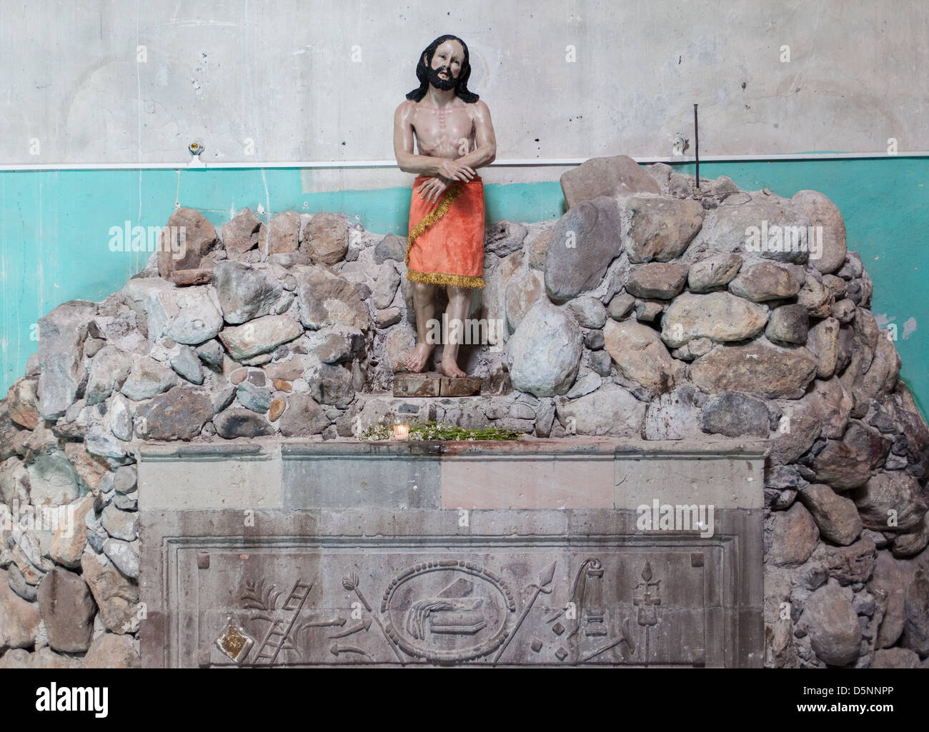 Rock alter with a statue of Jesus Christ in an old church in San Miguel ...