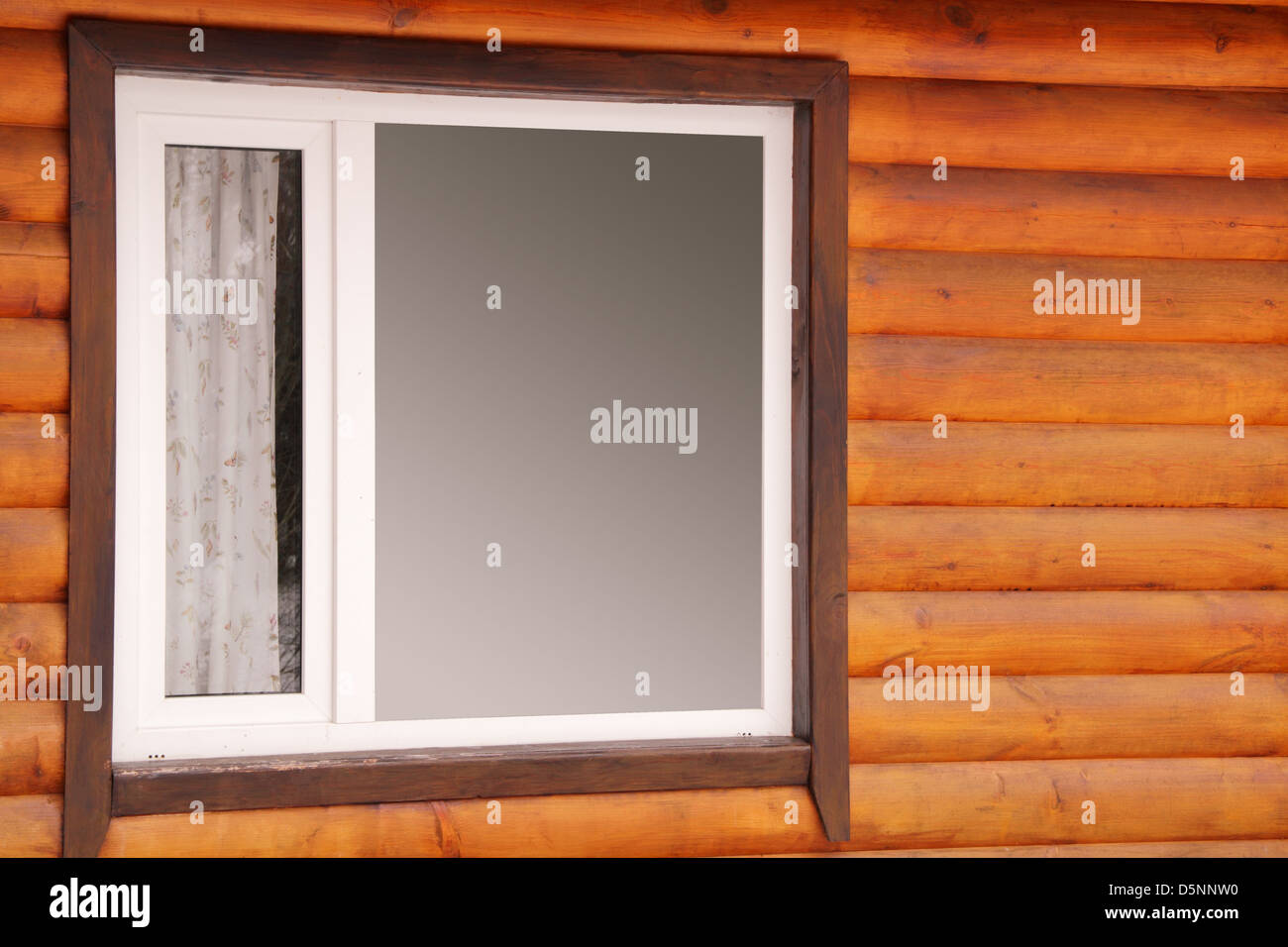 window of the cottage of logs Stock Photo - Alamy