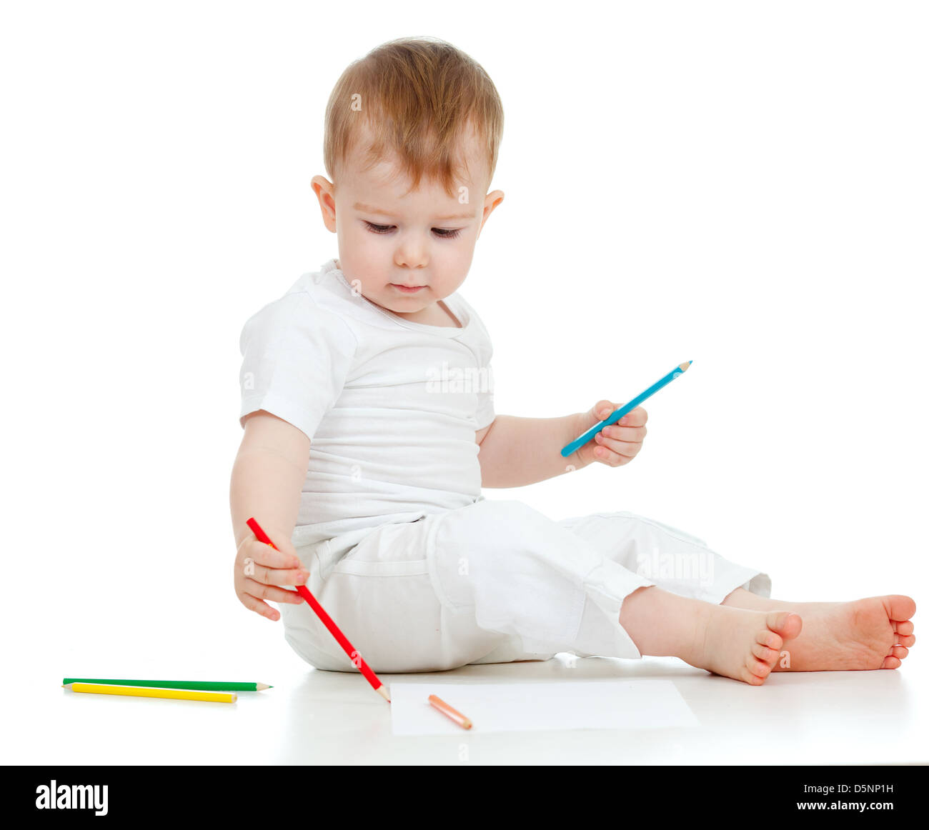child boy drawing with color pencils Stock Photo - Alamy