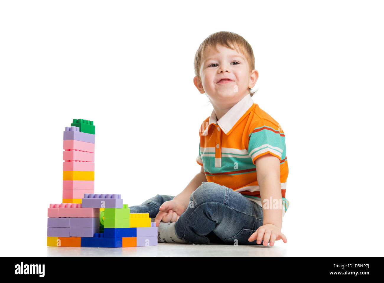 cheerful child boy with construction set over white background Stock ...