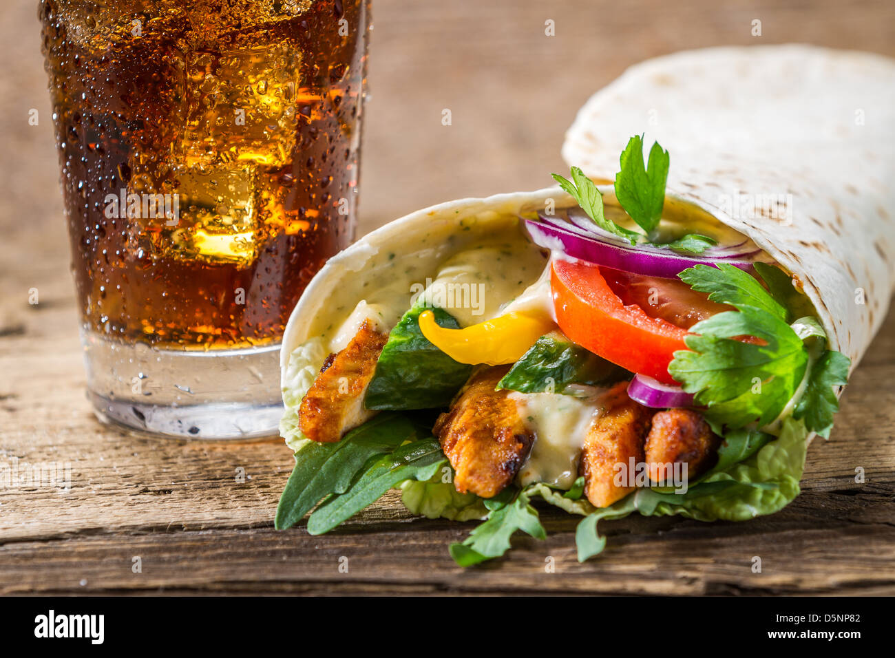 Closeup of kebab served with cold cola Stock Photo - Alamy