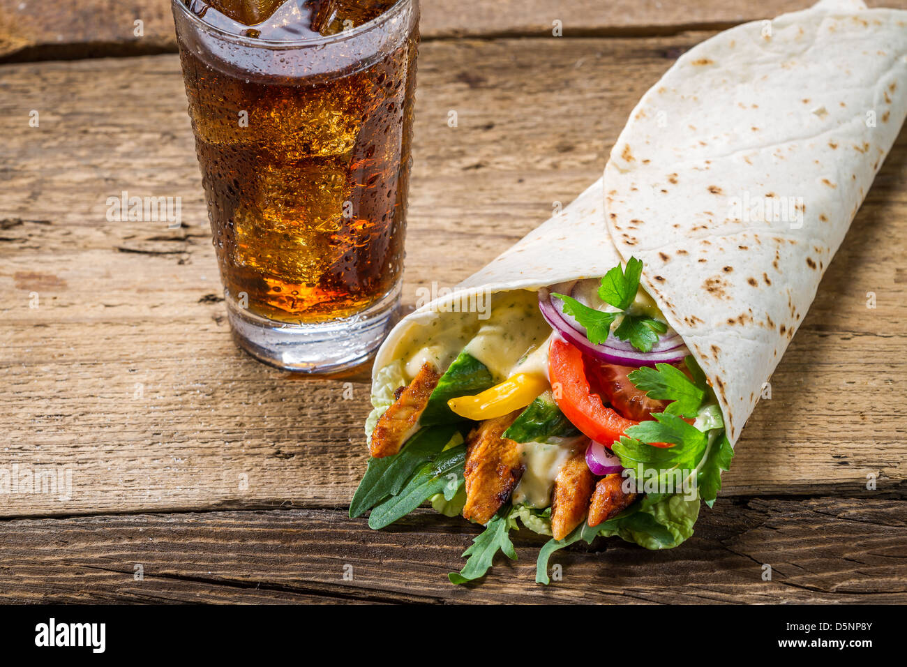 Kebab made of vegetables and chicken served with cold cola Stock Photo ...