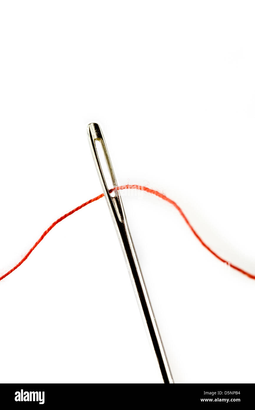Needle with a thread Stock Photo - Alamy