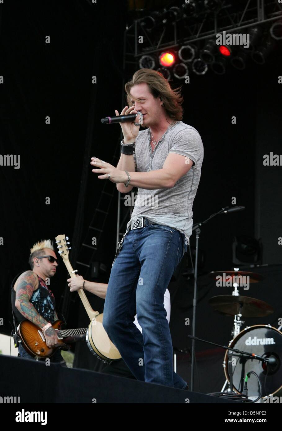 Tyler Hubbard of Georgia Florida Line on stage for The ACM Experience ...