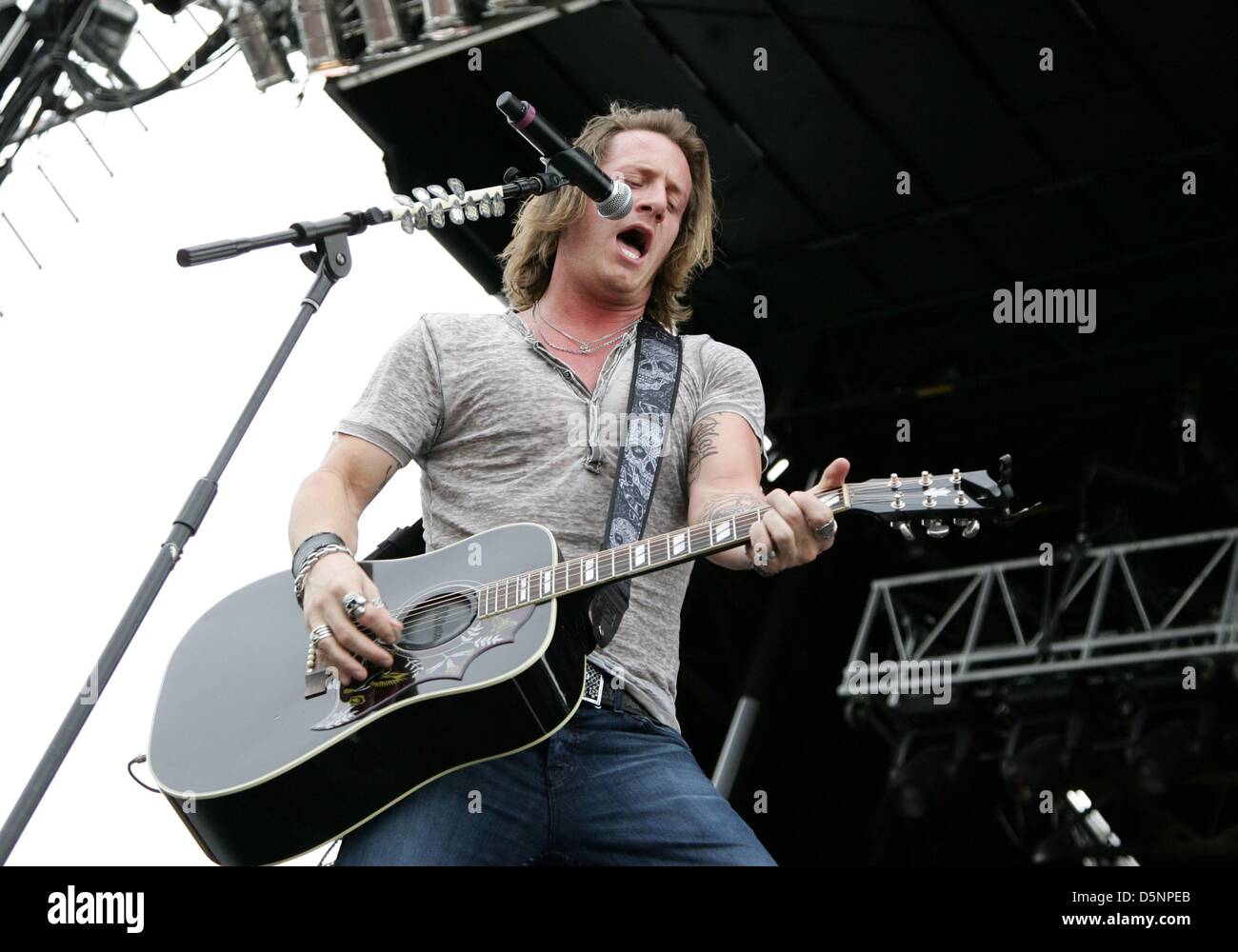 Tyler Hubbard of Georgia Florida Line on stage for The ACM Experience ...