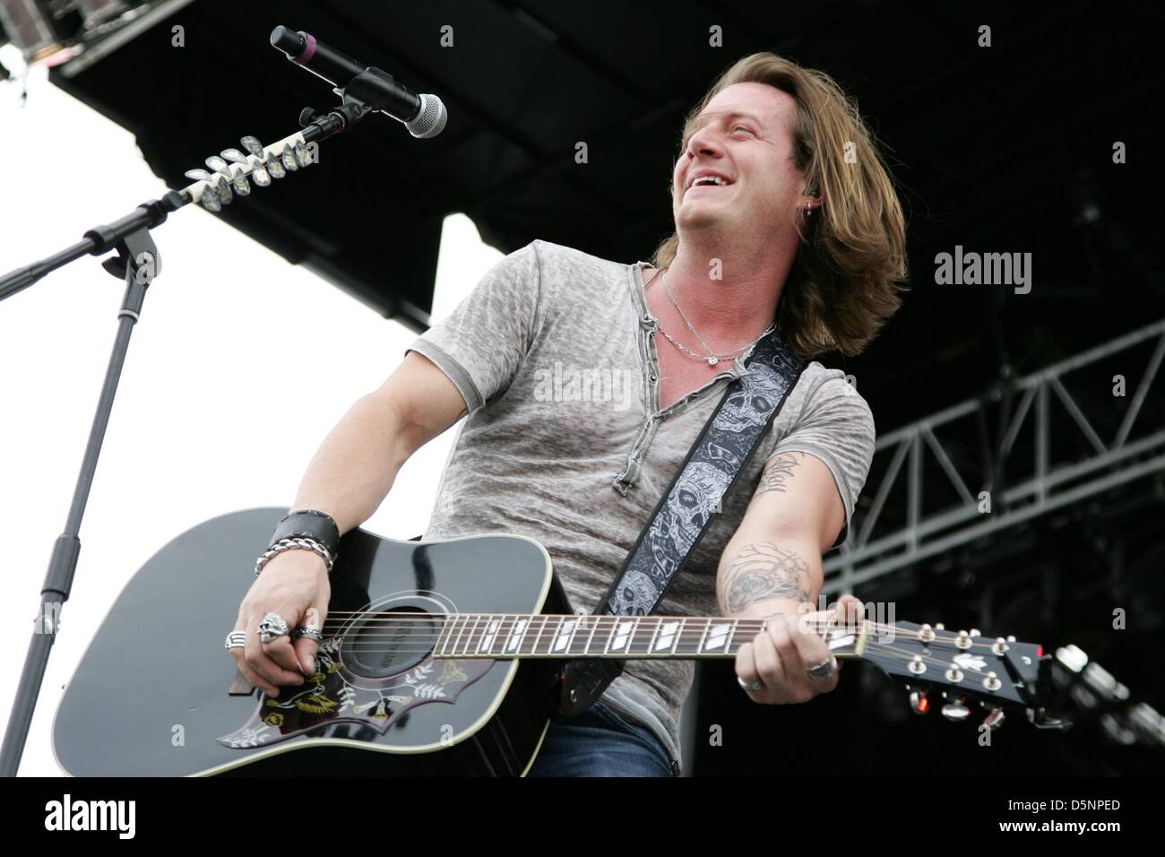 Tyler Hubbard of Georgia Florida Line on stage for The ACM Experience ...