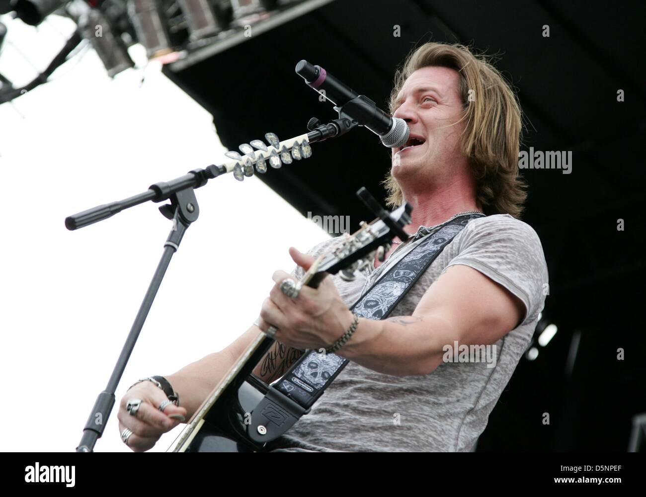 Tyler Hubbard of Georgia Florida Line on stage for The ACM Experience ...