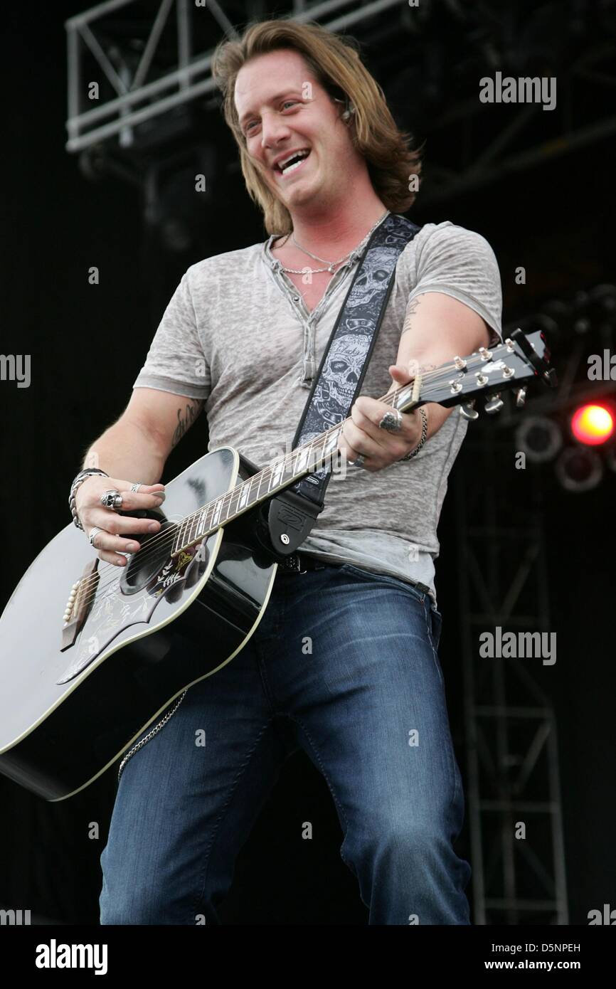 Tyler Hubbard of Georgia Florida Line on stage for The ACM Experience ...