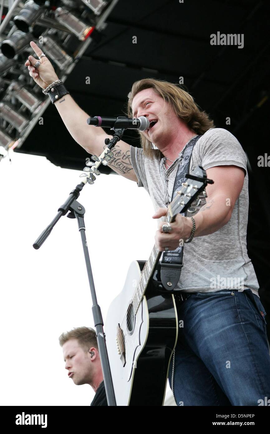 Tyler Hubbard of Georgia Florida Line on stage for The ACM Experience ...