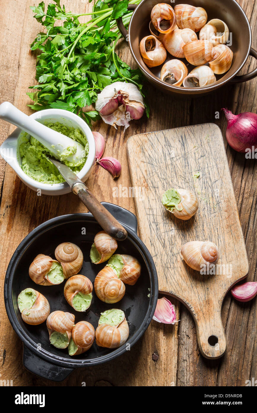 Cooking snails garlic butter hi-res stock photography and images - Alamy