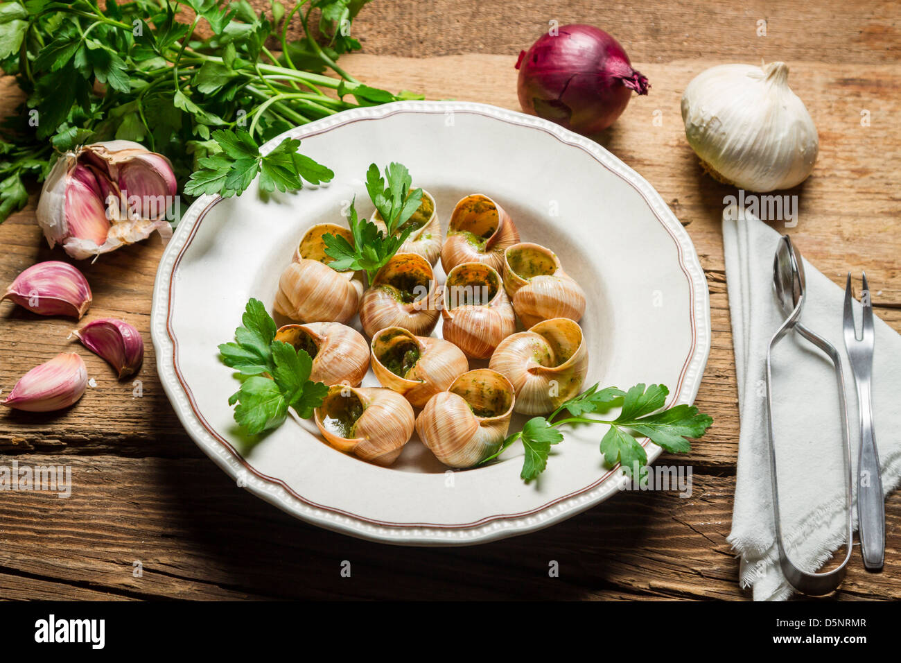 Homemade baked snails with garlic butter Stock Photo - Alamy