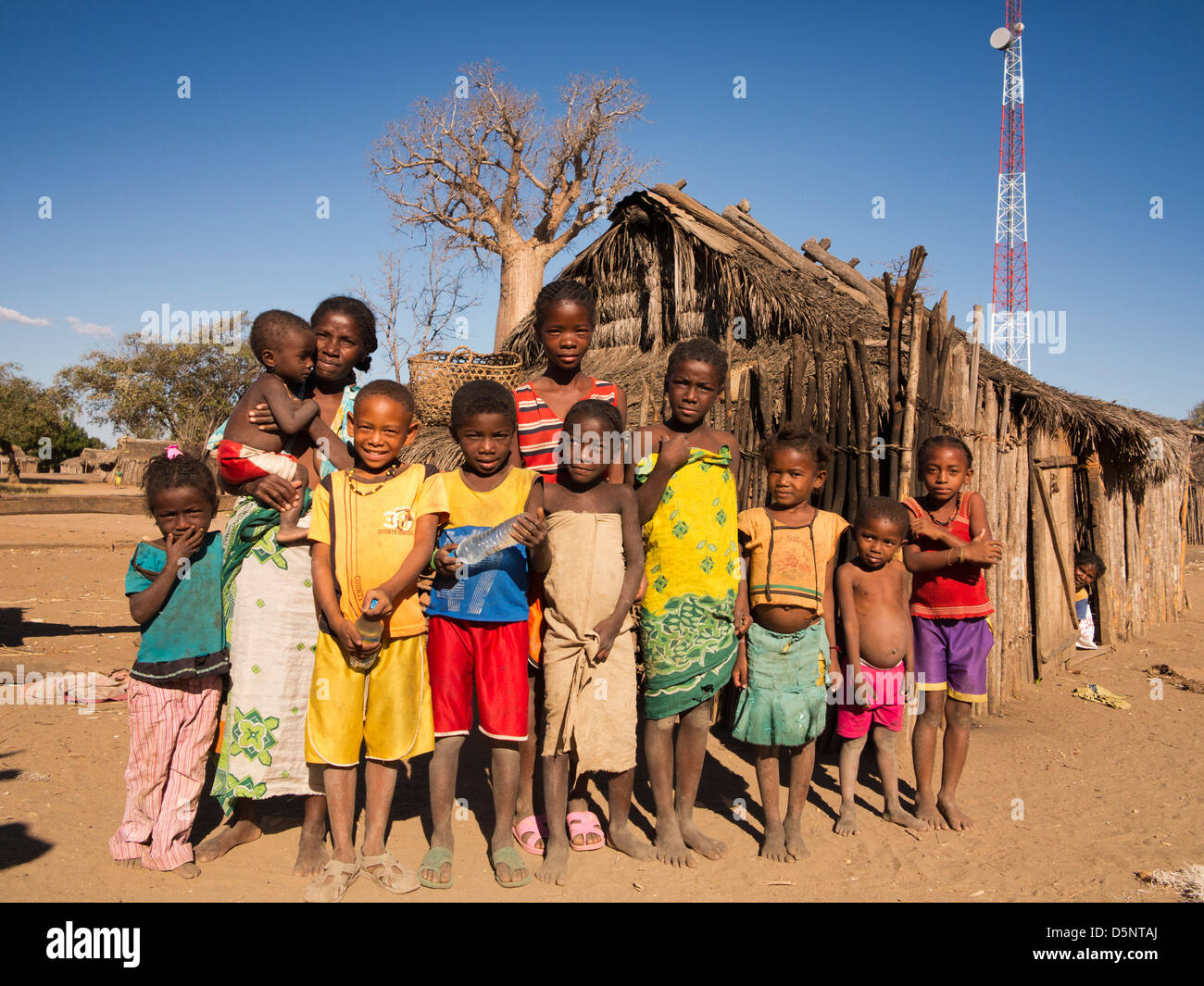 Madagascar, Morondava, Marofandilia village, large young family outside ...