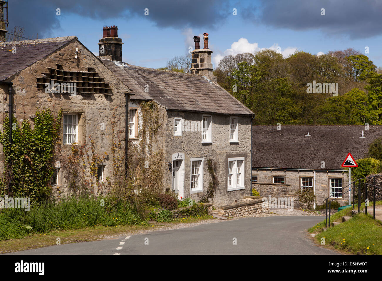 UK, England, Yorkshire, Airton, dovecote built into gable end of house ...