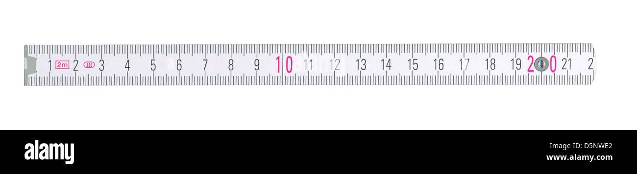 Close up of a carpentry ruler on white background Stock Photo - Alamy