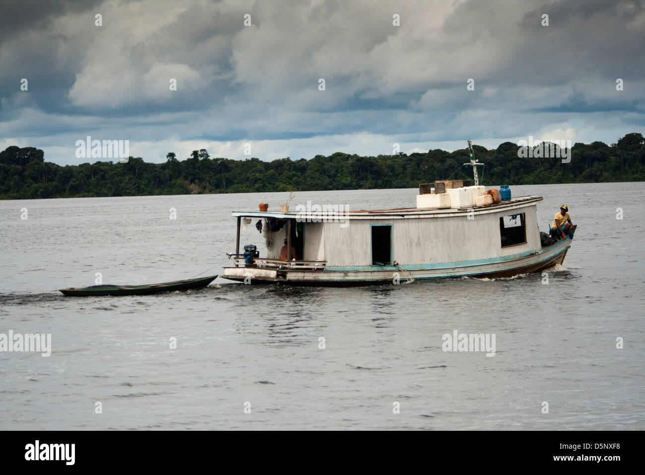 People in boats at black river close to Novo Airão city Anavilhanas ...