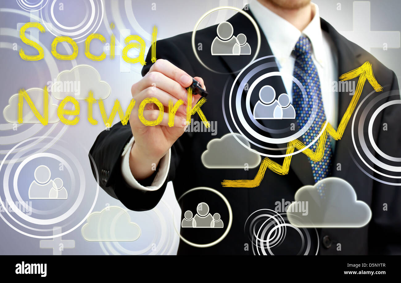 Businessman drawing social network with rising arrows Stock Photo - Alamy