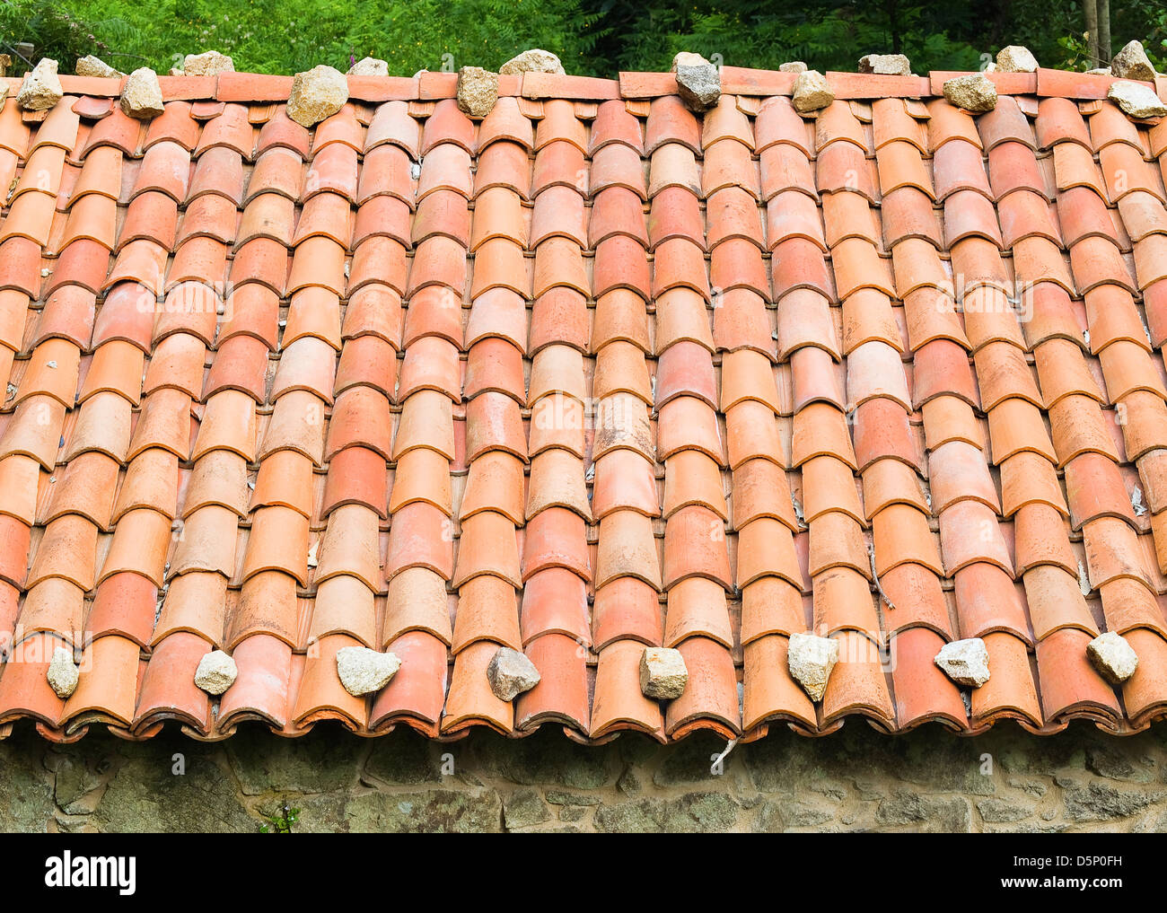 Architectural detail of a red tile roof in a traditional house of ...